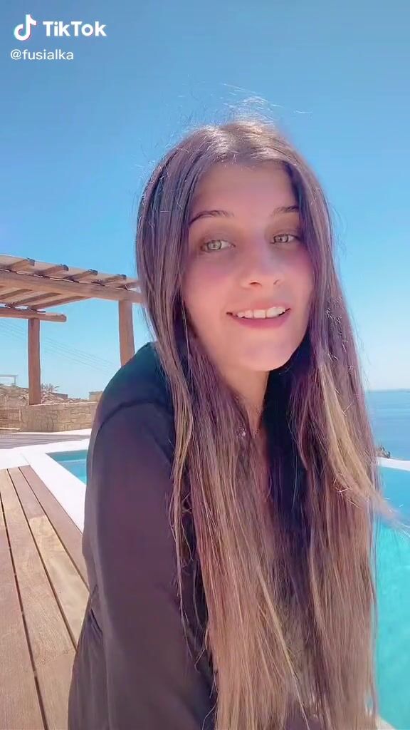 Sexy Kasia Bożek Shows Cleavage in Black Bikini | sexyfilter.com