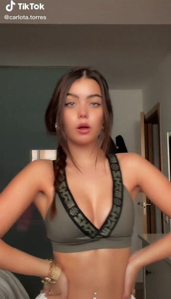 Cute Carlota Torres Shows Cleavage In Sport Bra