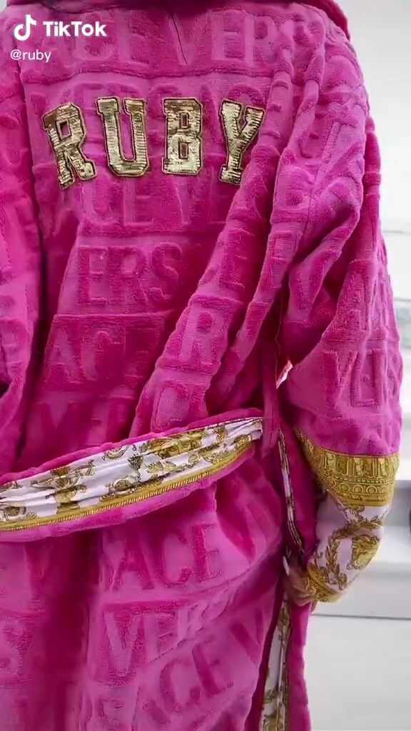 Sexy Ruby Shows Cleavage in Pink Bathrobe | sexyfilter.com