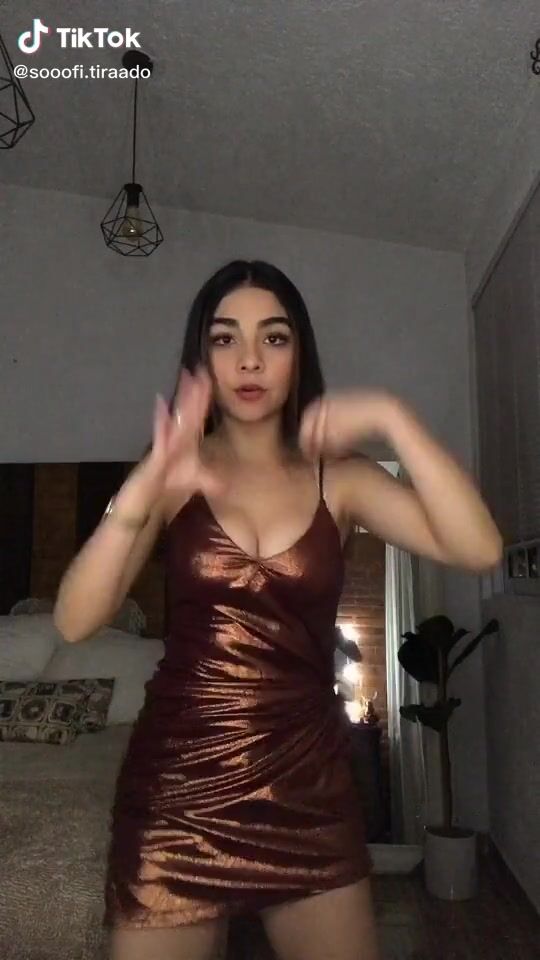 Hot Sofi Tirado Shows Cleavage in Golden Dress | sexyfilter.com